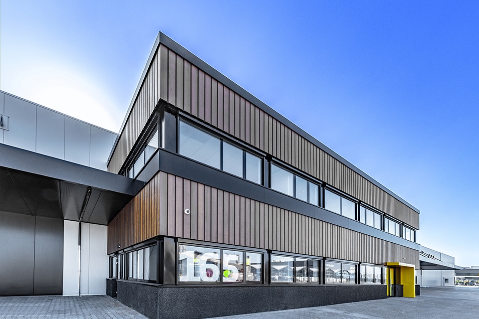 Four colossal laminated beams