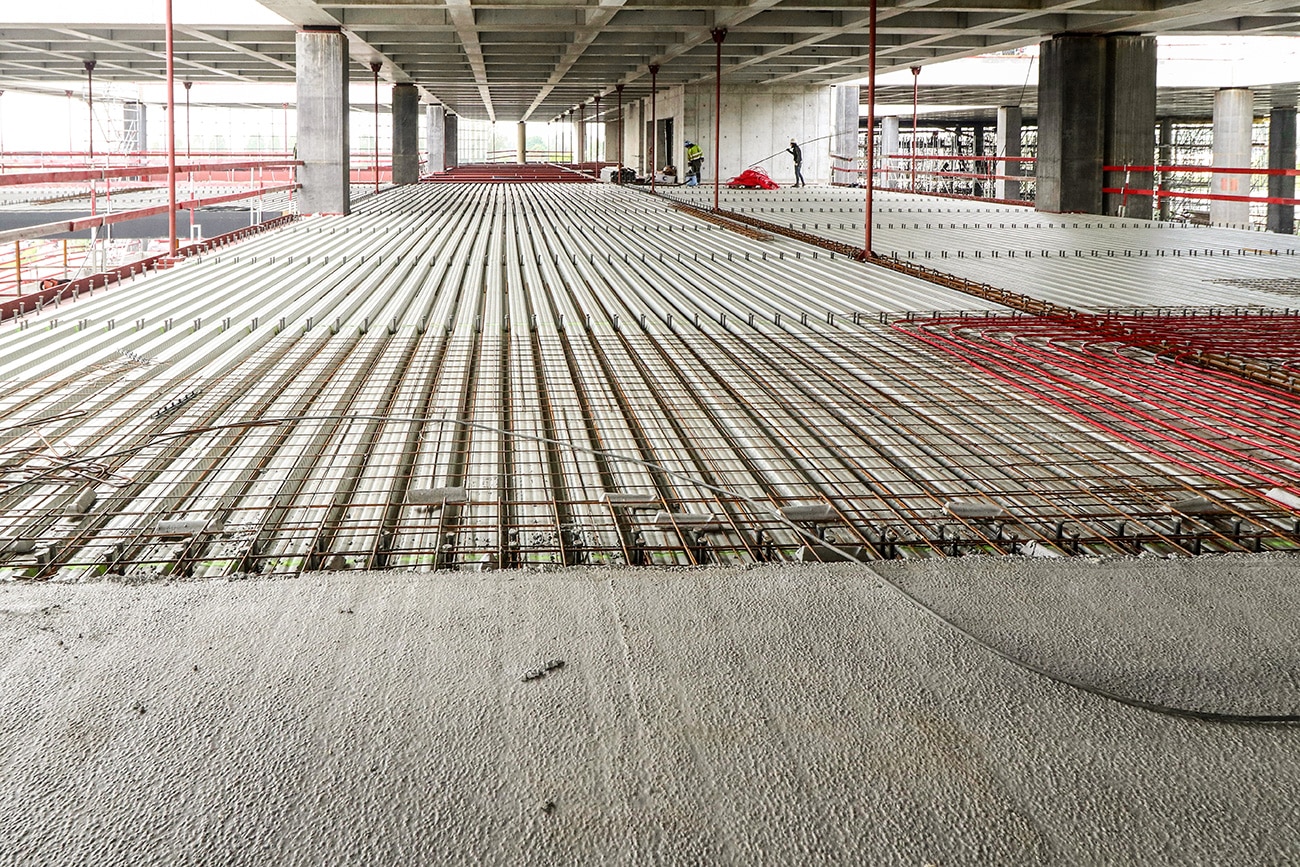 Ongeïsoleerde en hybride staalplaat-betonvloeren